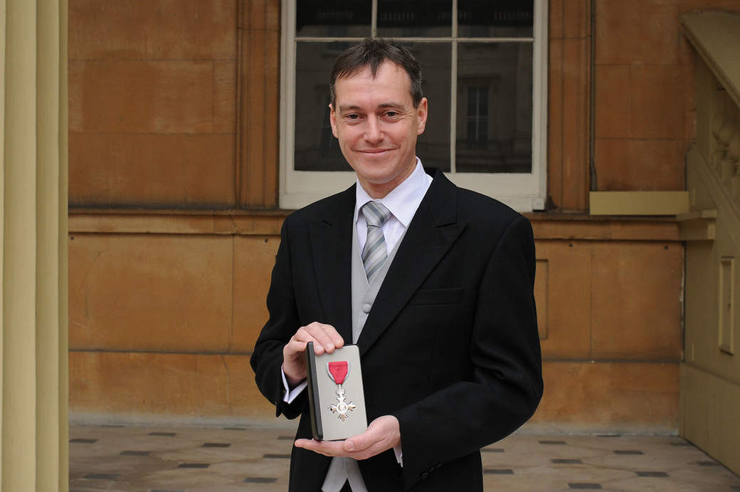 Ian Burrell receives the MBE | FIM